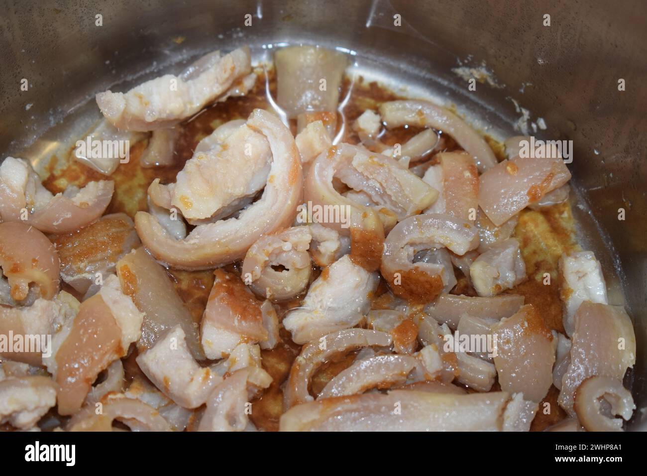 fried pork skin in a pot Stock Photo - Alamy