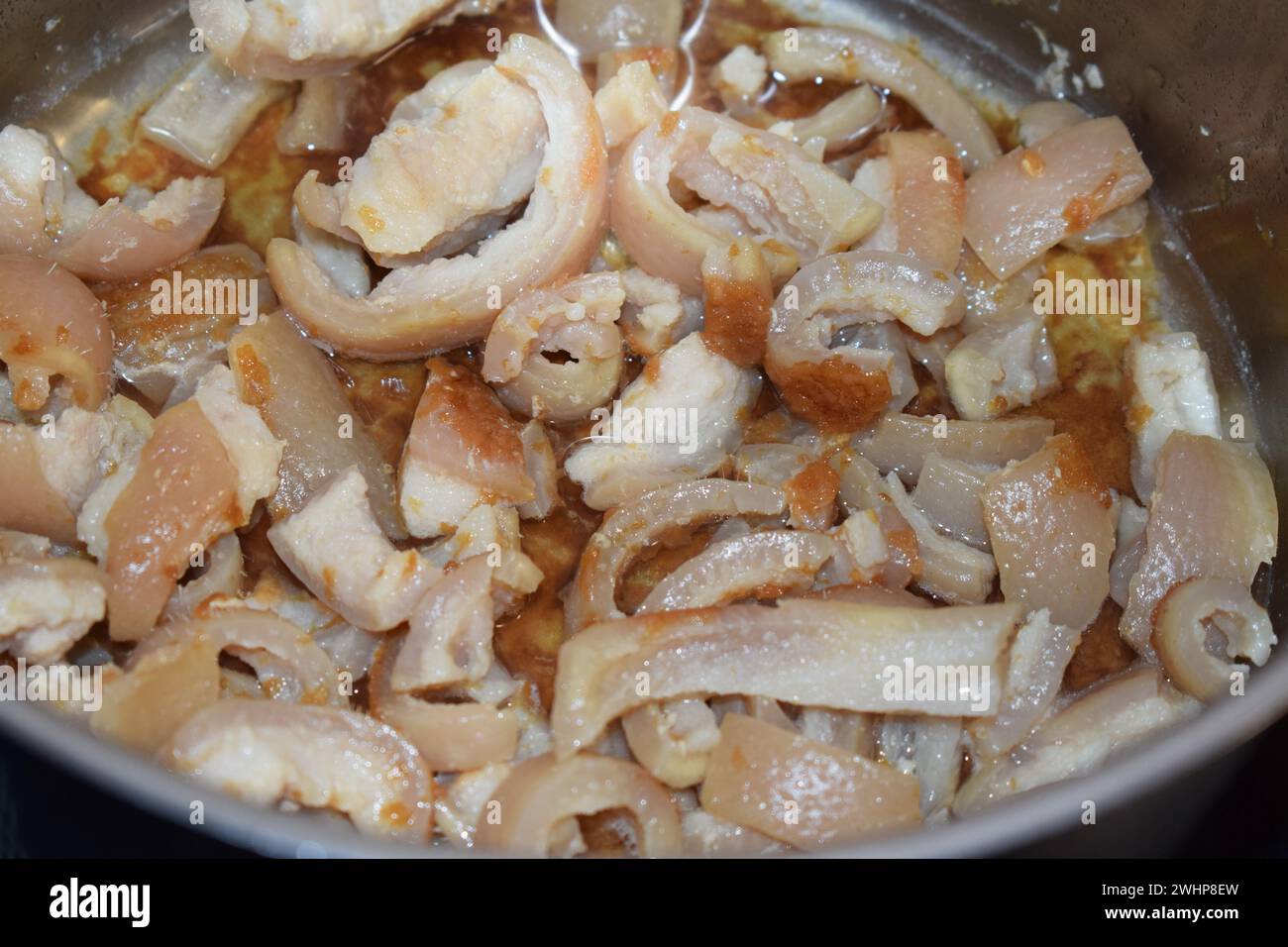 fried pork skin in a pot Stock Photo - Alamy