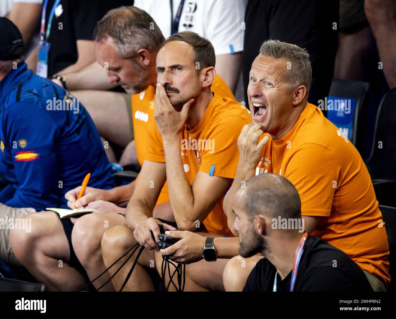 DOHA - Coach Patrick Pearson and coach Mark Faber during the women's 4 ...