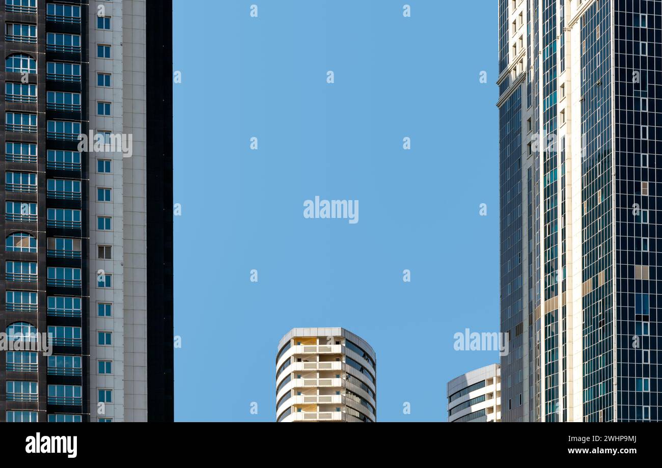 Many windows and walls facade of a modern skyscraper without people ...