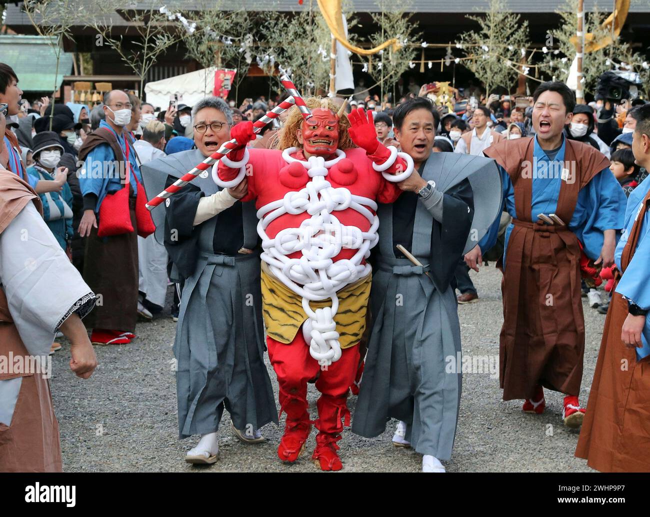 Aka-oni, a red demon walks zigzag on the shrine path like thunder ...