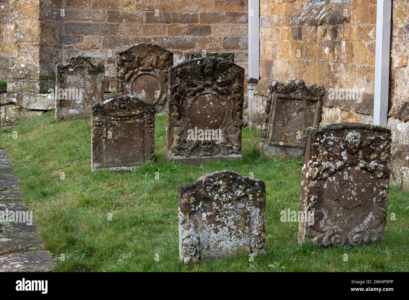 Old gravestones at St. Michael`s churchyard, Warmington, Warwickshire ...