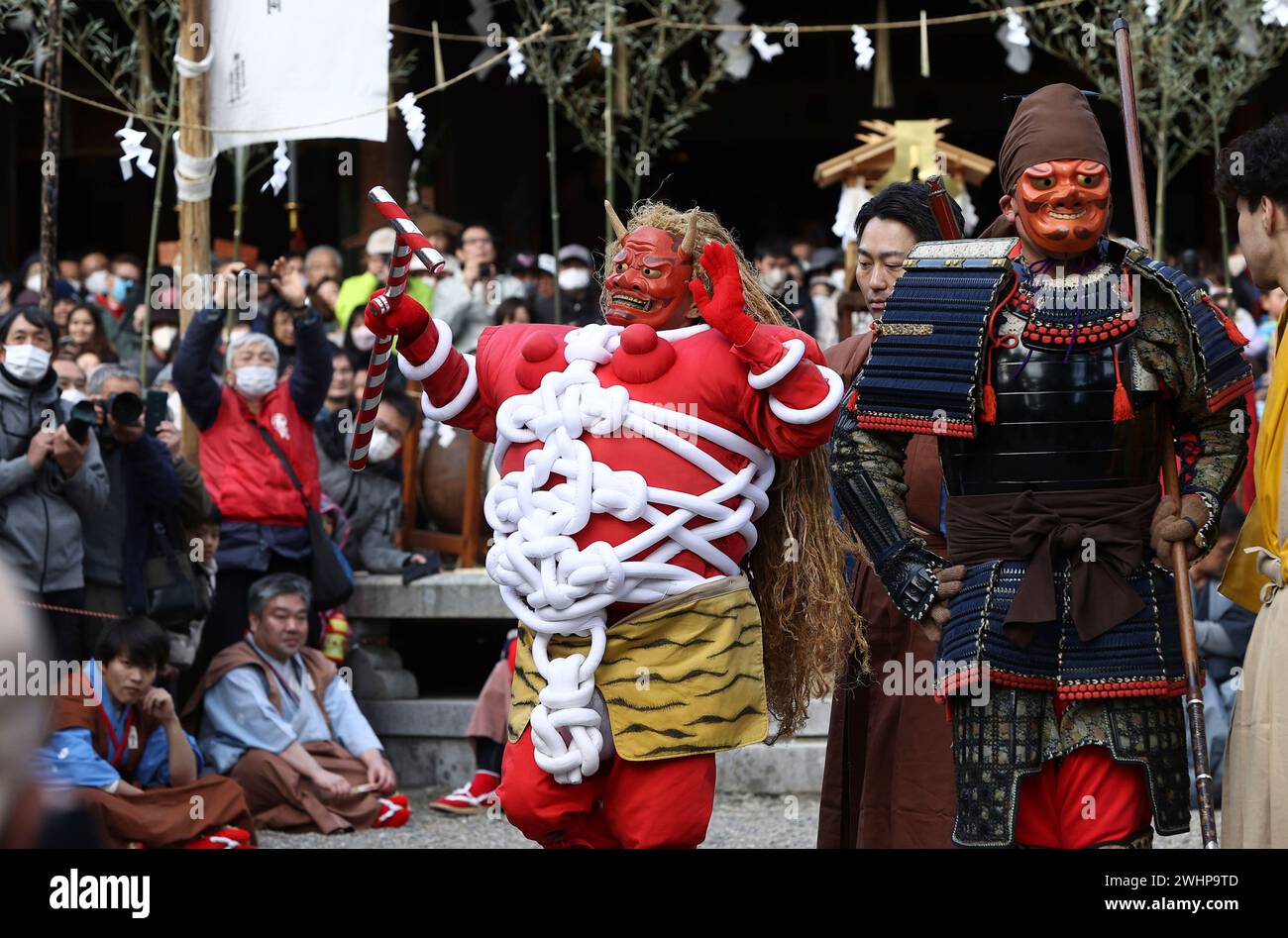 Aka-oni, a red demon (L) and Tengu (long-nosed goblin)" walk on the ...