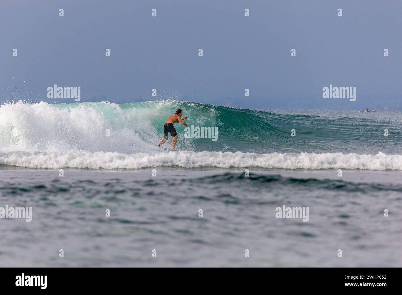 Surfing in Bingin Beach, Uluwatu Bali Island, Indonesia Stock Photo - Alamy