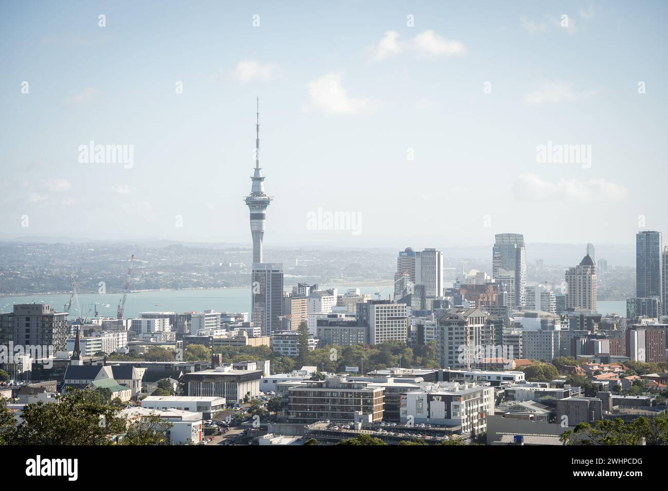 Central business district in a city with big tower dominating the ...