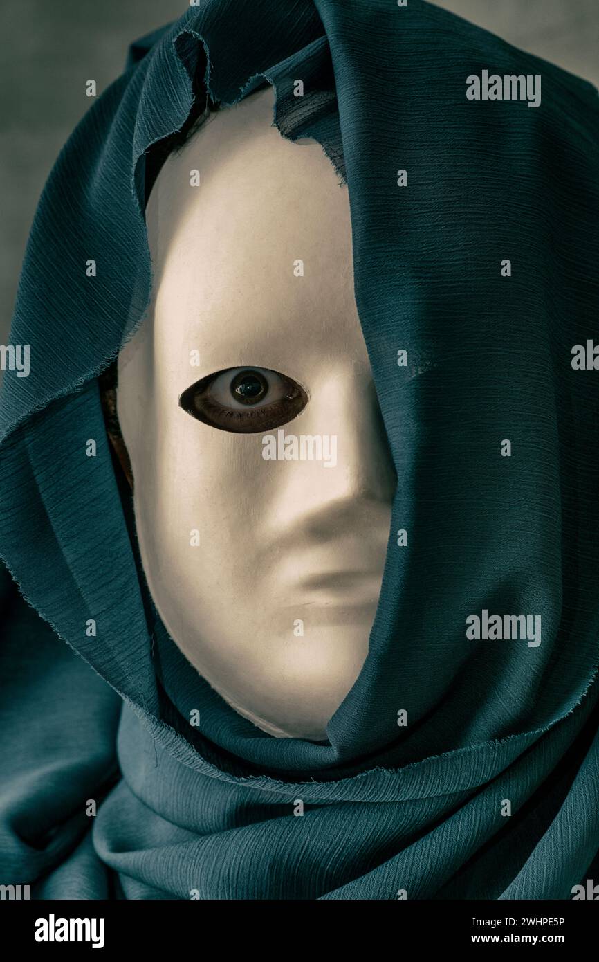 Mysterious female wearing a white mask Stock Photo - Alamy