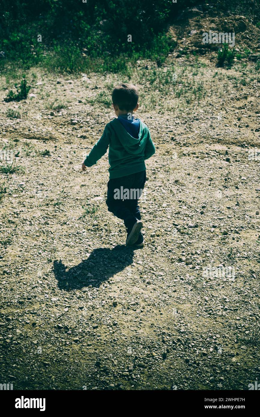 Kids running outdoors hi-res stock photography and images - Alamy