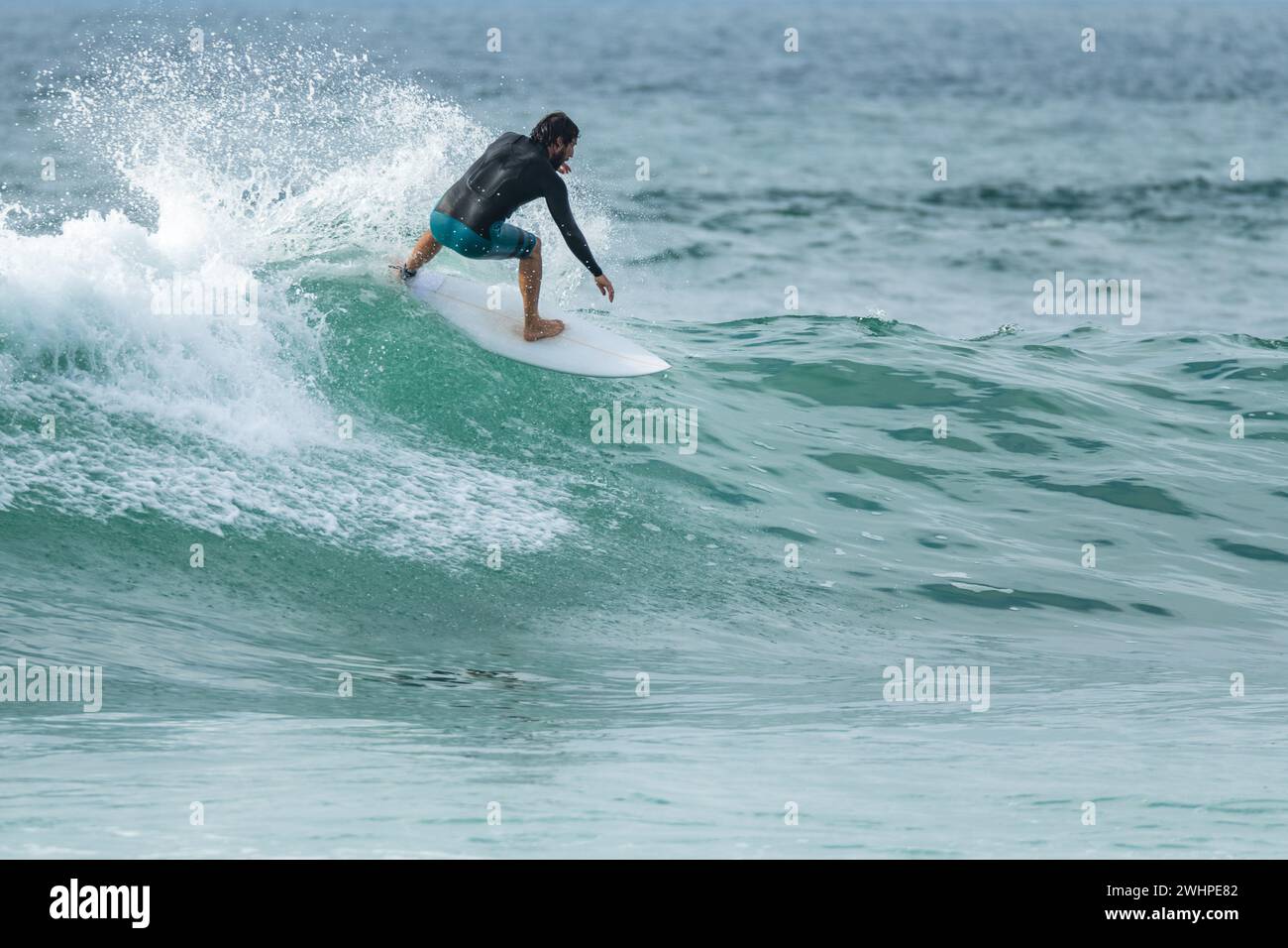 Riding the wave waves hi-res stock photography and images - Alamy