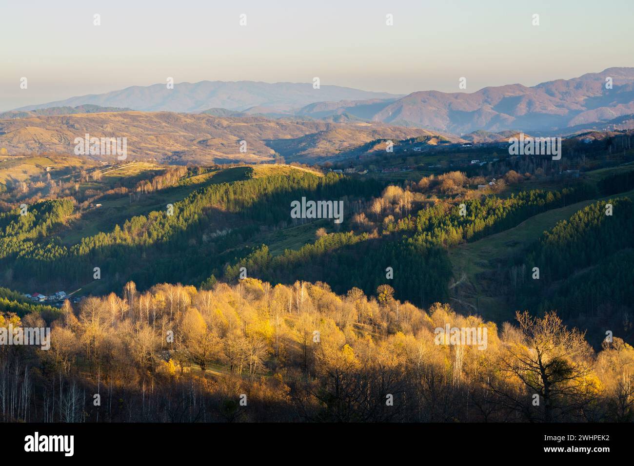 Sunset in Cindrel Mountains in Romania in autumn with golden and pastel ...