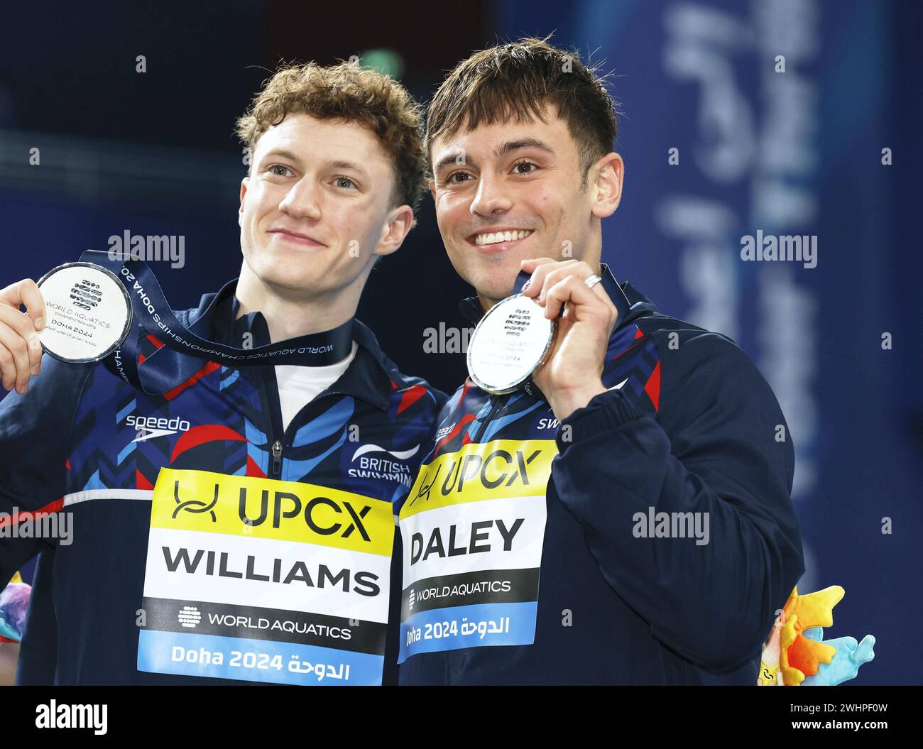Britain's Thomas Daley (R) and Noah Williams pose for a photo after winning silver in the men's ...