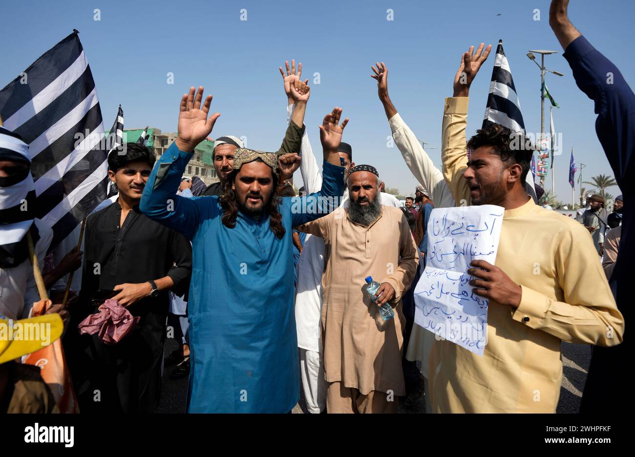 Supporters Of Religious Party Jamiat Ulema E Islam Block A Road As They