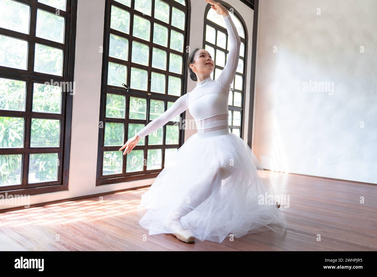 Flexible young ballet dancer stretching hi-res stock photography and ...