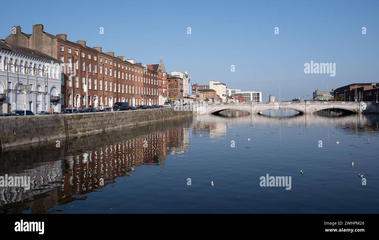 Urban cityscape of cork city river lee and Saint particks bridge ...