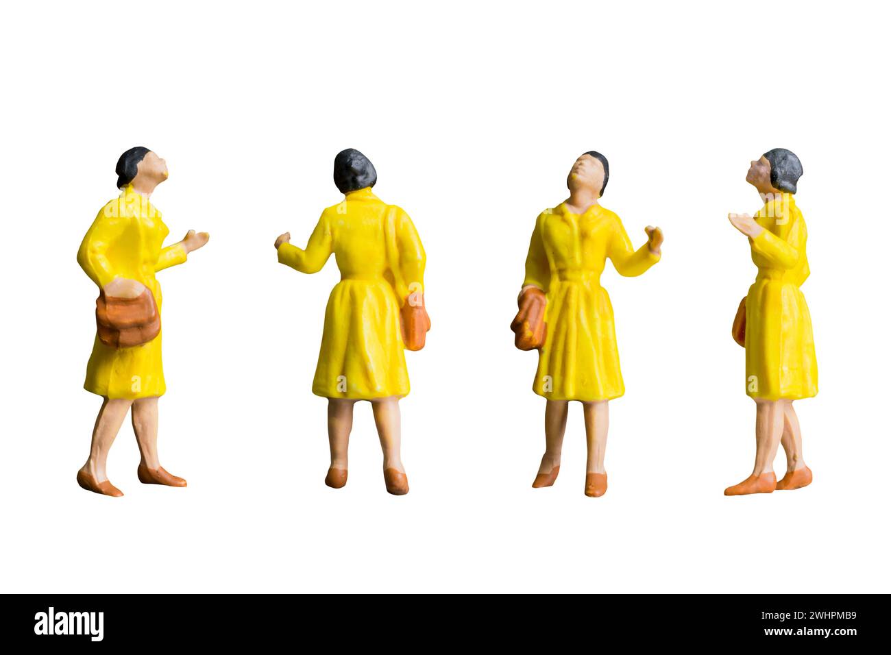 Miniature people isolated on white background Stock Photo - Alamy