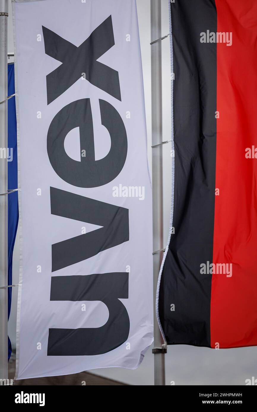 PRODUCTION - 07 February 2024, Bavaria, Fürth: A flag with the uvex logo flies at the uvex group ...