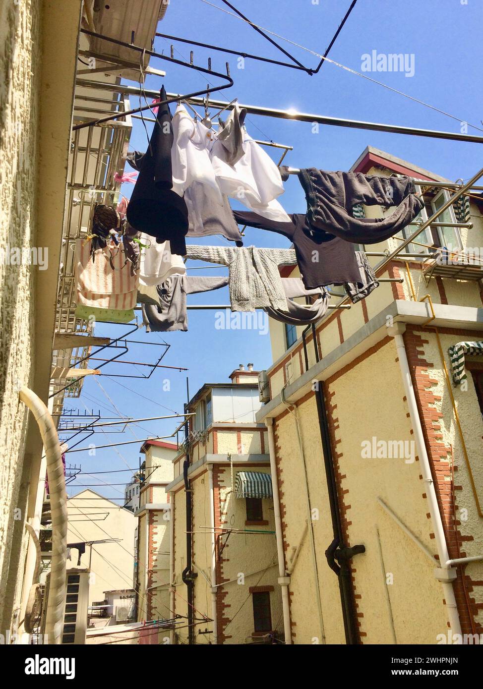 Laundry drying outside on a clothesline Stock Photo - Alamy