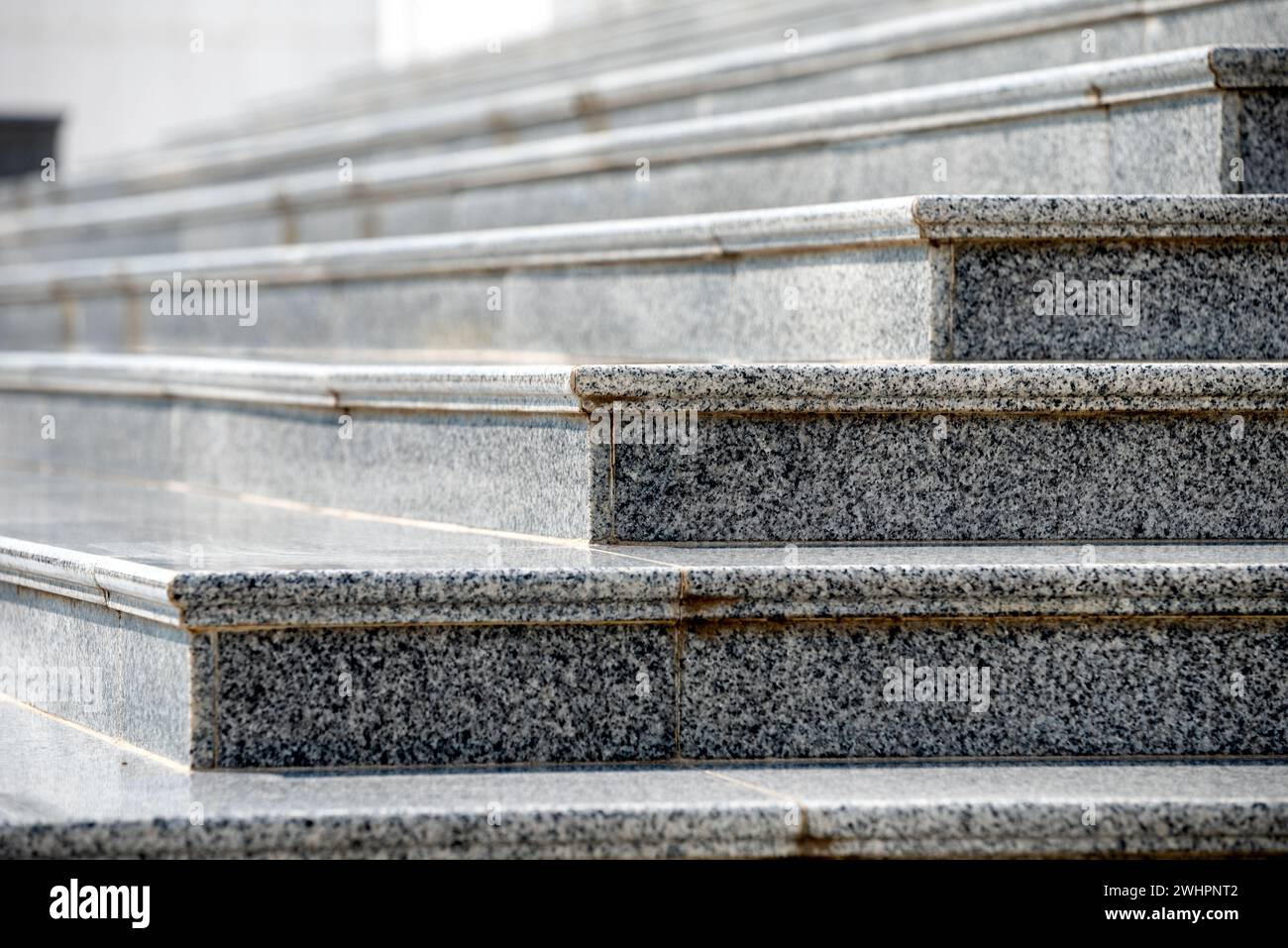 Steps of an empty stone granite staircase close up Stock Photo - Alamy