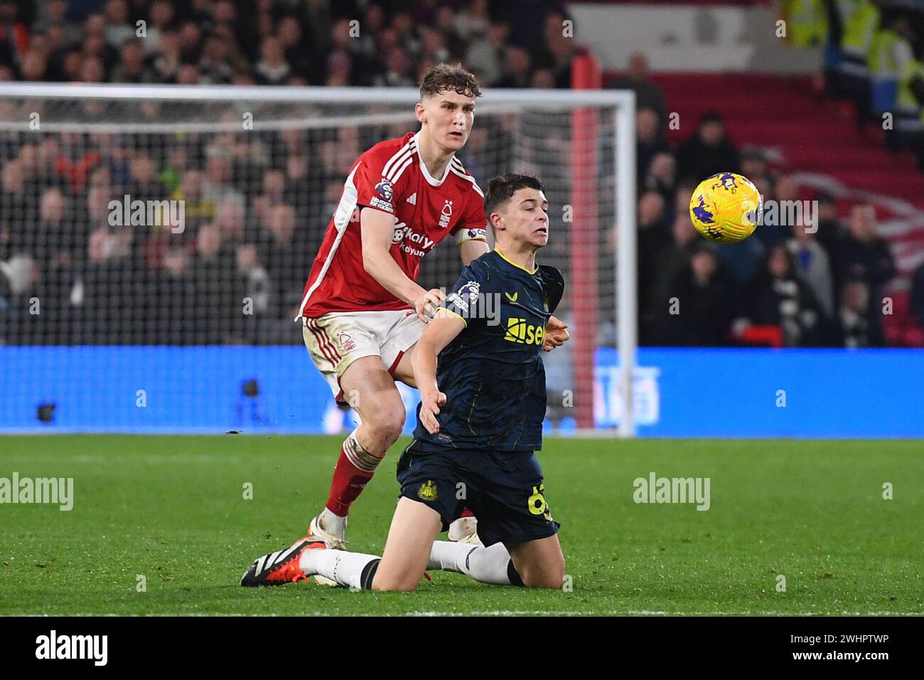 Ryan Yates of Nottingham Forest tackles Lewis Miley of Newcastle United ...