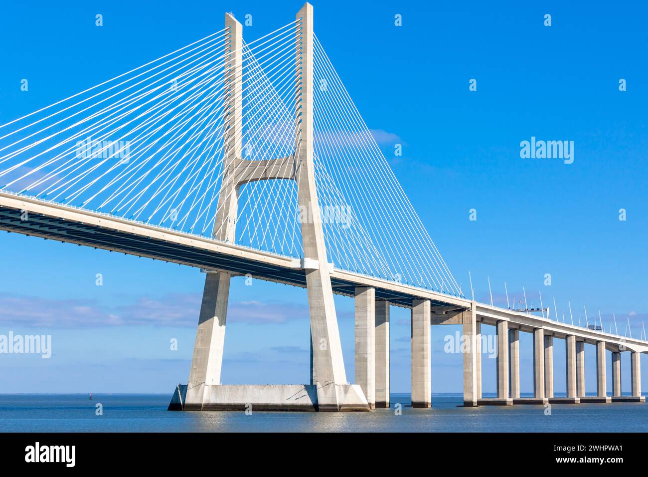 Modern bridge fragment: white against bright blue Stock Photo - Alamy