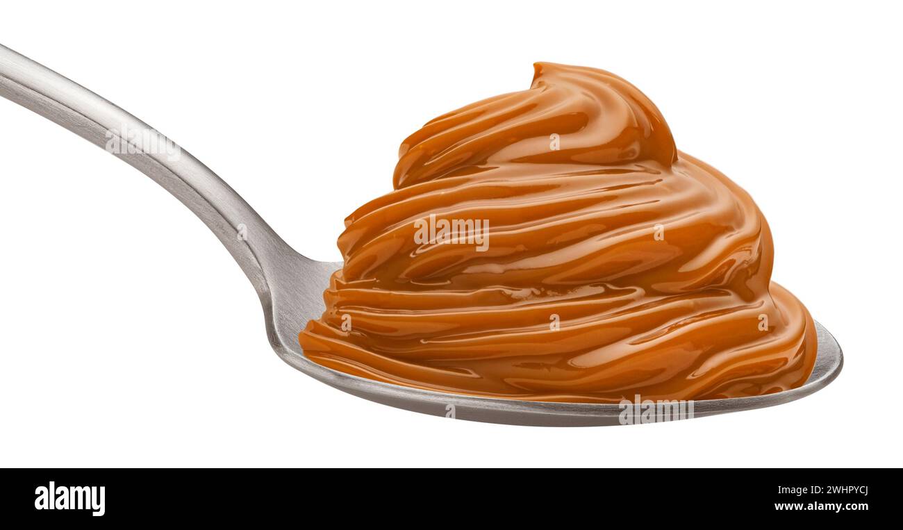 Caramel cream, boiled condensed milk swirl in spoon isolated Stock ...