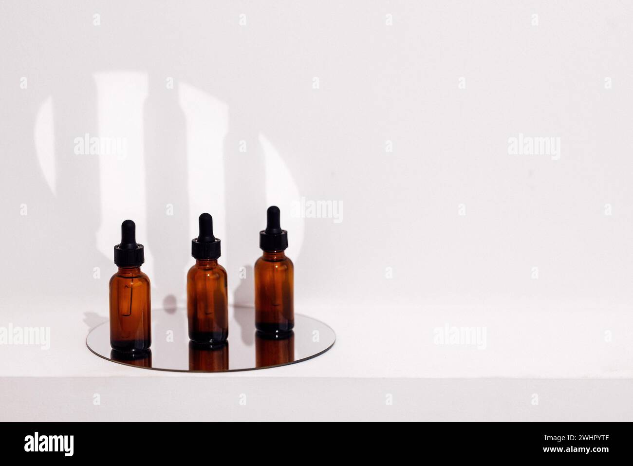 Group of brown bottles and their reflection on a mirror surface Stock ...