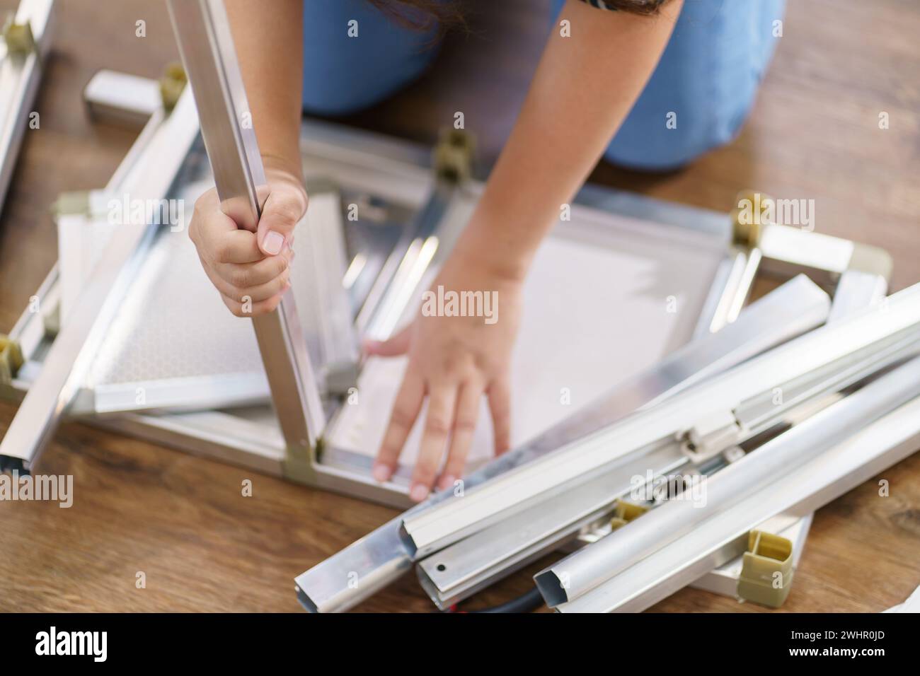 Asian Woman self repairs furniture renovation using equipment to diy ...