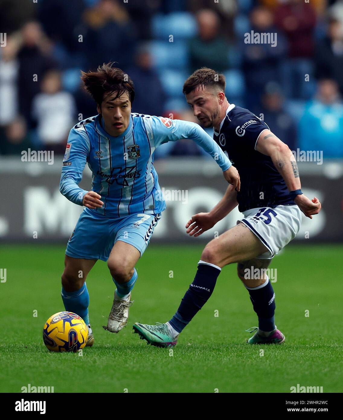 Coventry City's Tatsuhiro Sakamoto gets past Millwall's Joe Bryan ...
