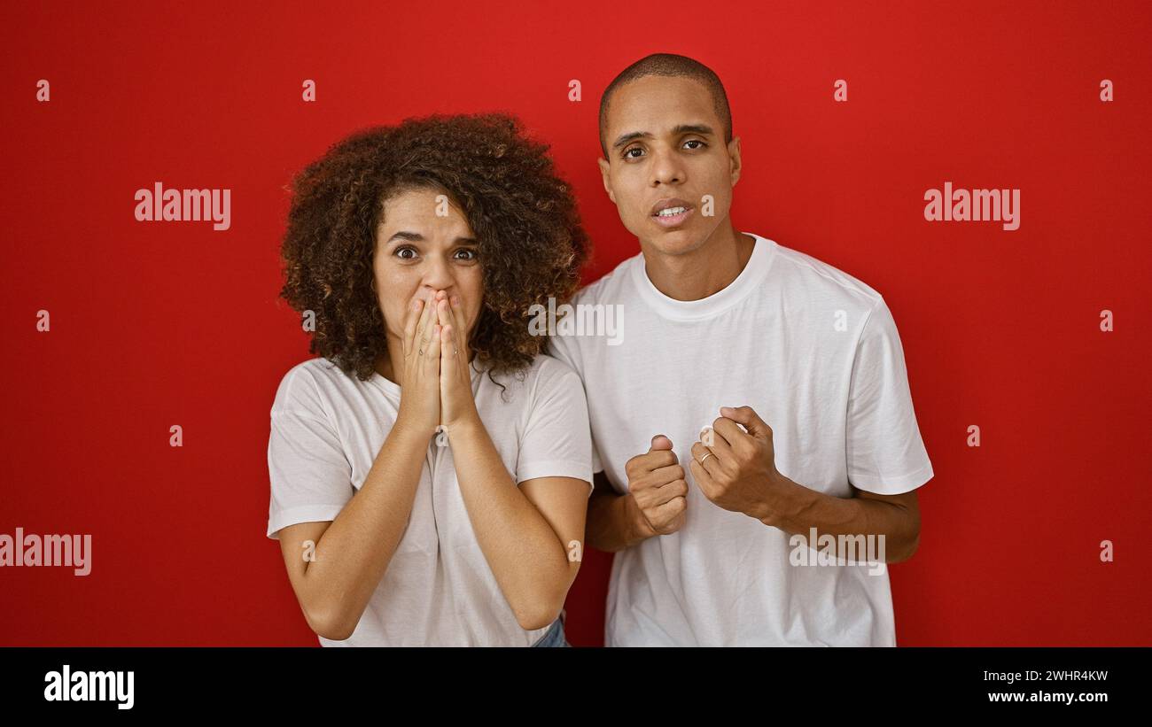 Joyful, confident couple celebrating their love, standing and smiling ...