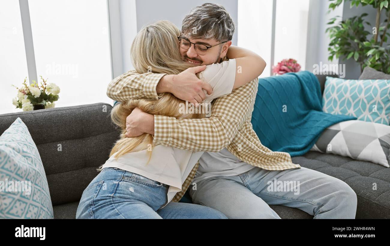 Joyful couple embraces warmly hi-res stock photography and images - Alamy
