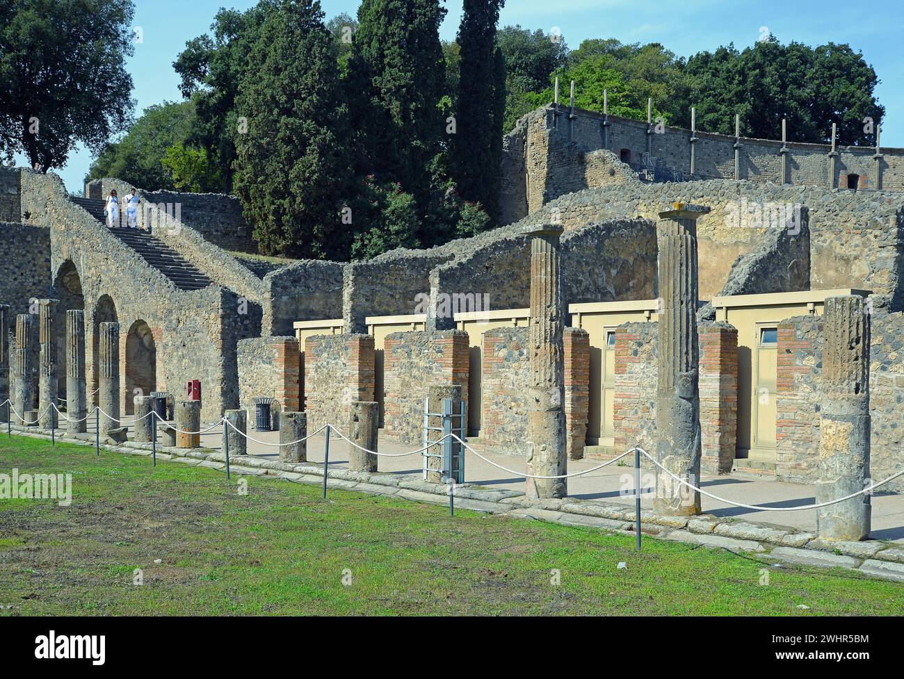 Columns and buildings around the theater seen from the Palaestra Stock ...