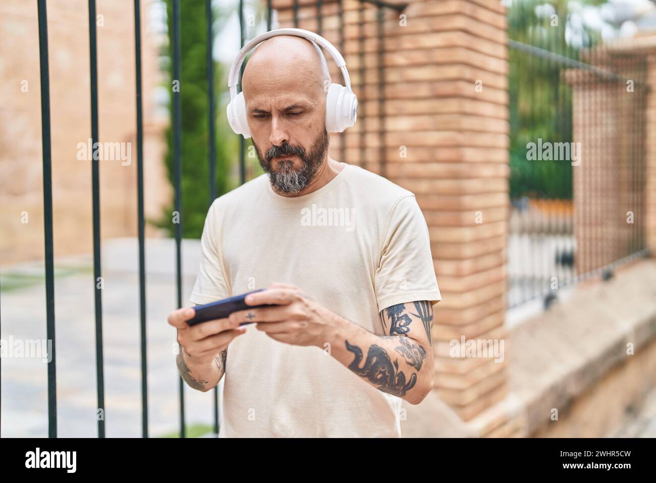 Bald male gamer playing hi-res stock photography and images - Alamy