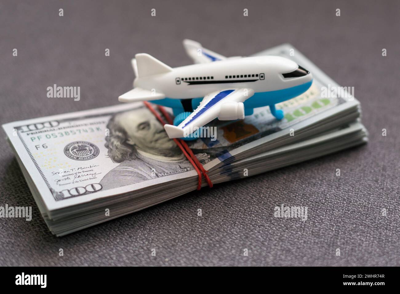 Model plane, airplane, money. Flat lay design Stock Photo - Alamy