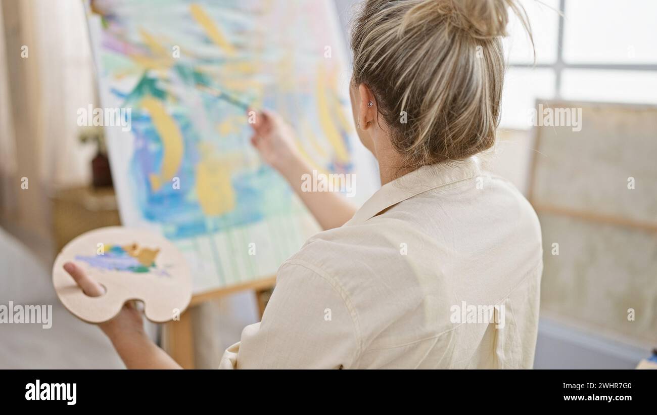 Young blonde woman artist drawing hi-res stock photography and images ...