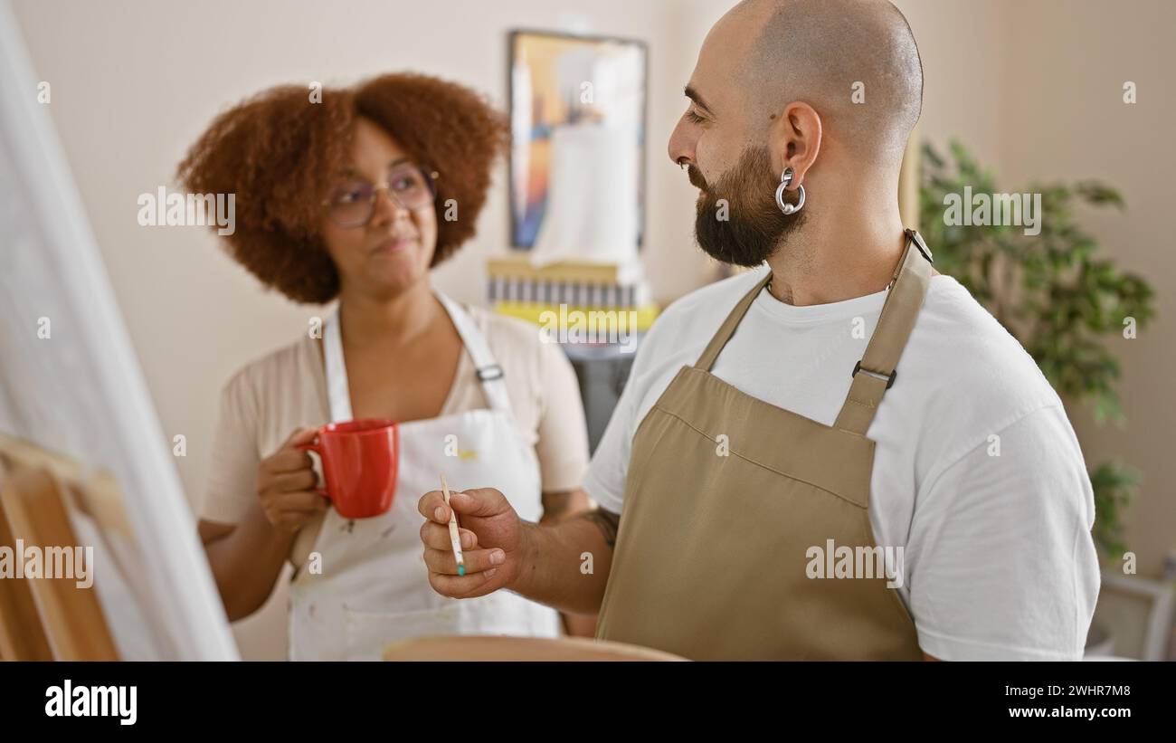 Two smiling artists confidently sipping coffee while drawing in a ...