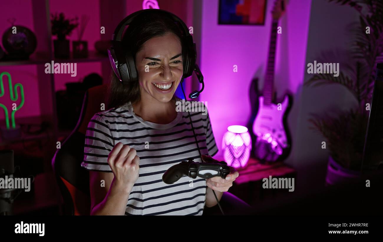 Epic win! dynamic young hispanic woman streamer, stunning with smile ...