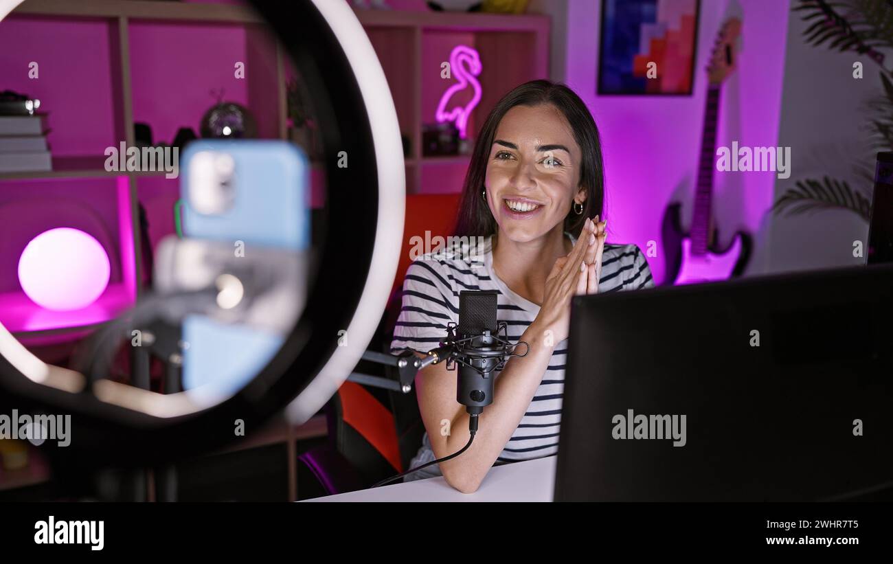 Young beautiful hispanic woman streamer smiling confident having video ...