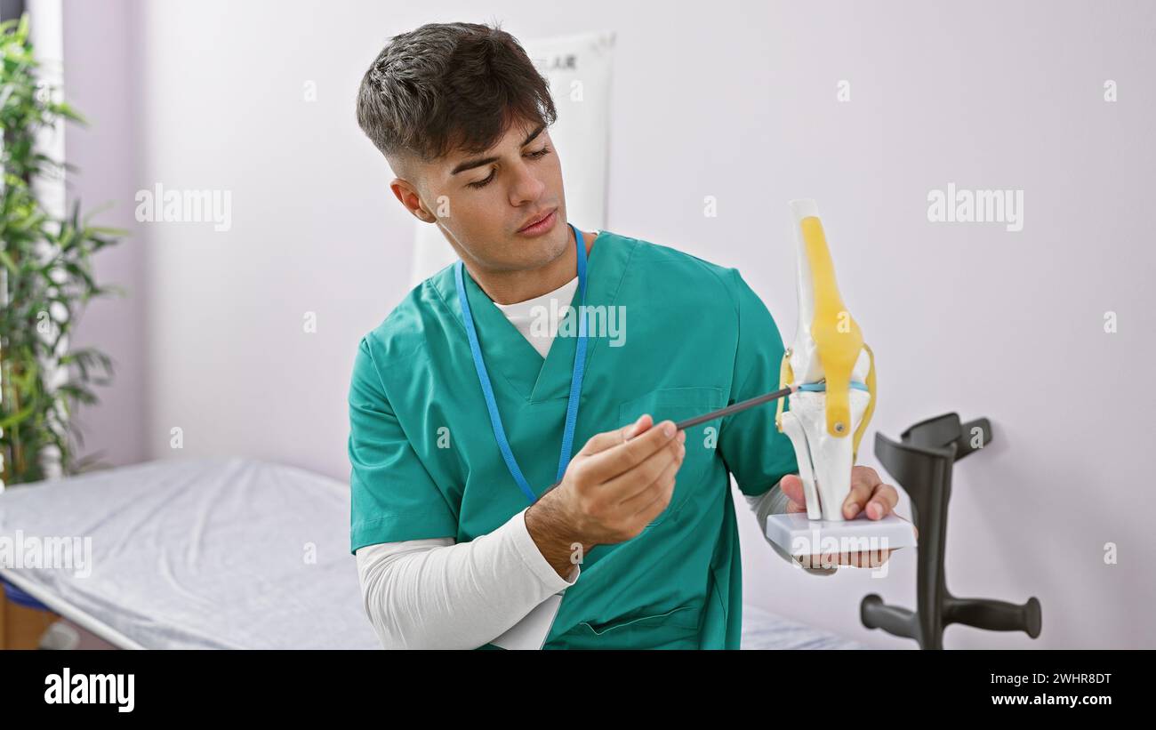 Handsome young hispanic man - a savvy physio in the rehab clinic ...