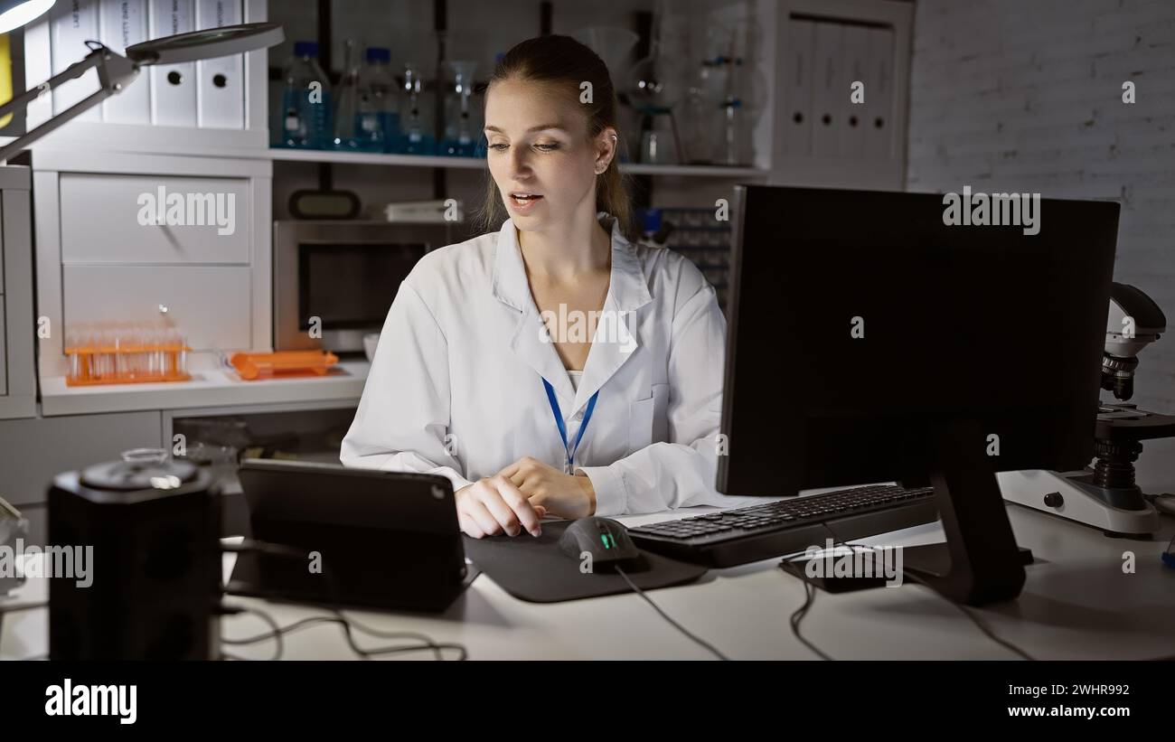 Researcher working computer in pharmaceutical hi-res stock photography ...