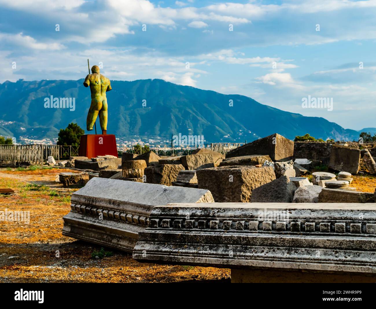 Amazing ruins of ancient city of Pompeii with a statue of polish ...