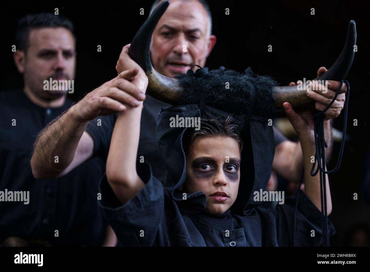 Luzon, Spain. 10th Feb, 2024. A boy is prepared to represent the devil ...