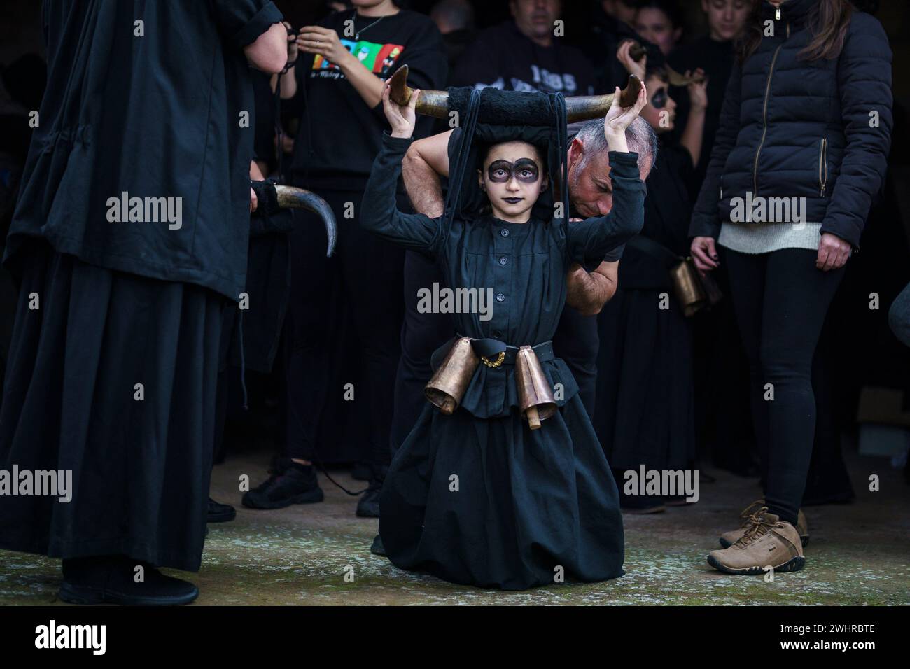 Luzon, Spain. 10th Feb, 2024. A girl is prepared to represent the devil ...
