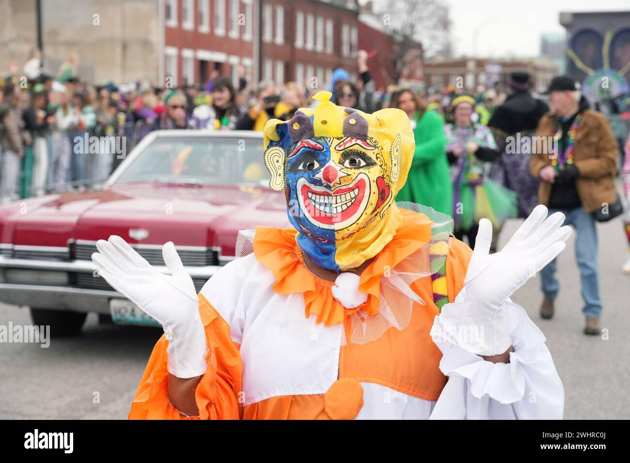 St. Louis, United States. 14th Feb, 2024. A parade participant wears a ...