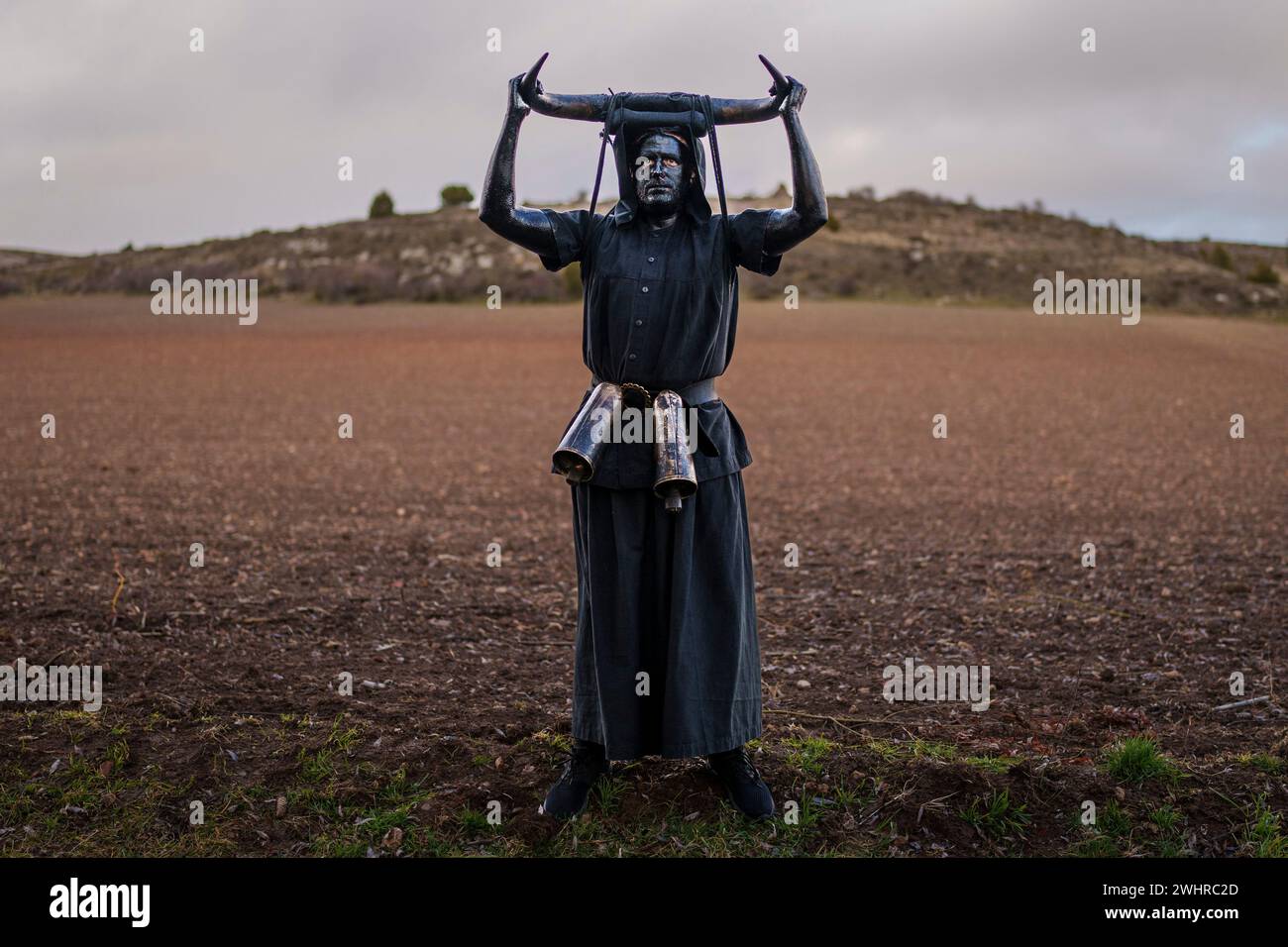 Luzon, Spain. 10th Feb, 2024. A man dressed to represent the devil dons ...
