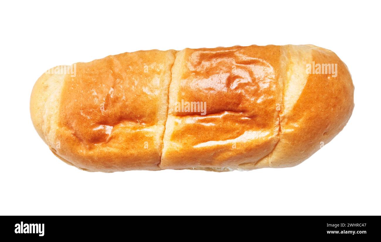 Close-up of a freshly baked isolated loaf, highlighting its golden ...