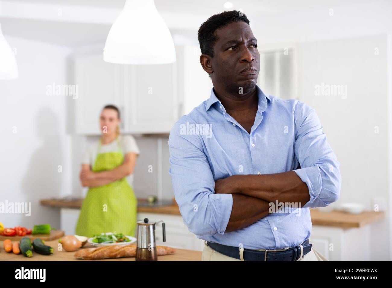 Man standing kitchen stressed hi-res stock photography and images - Alamy