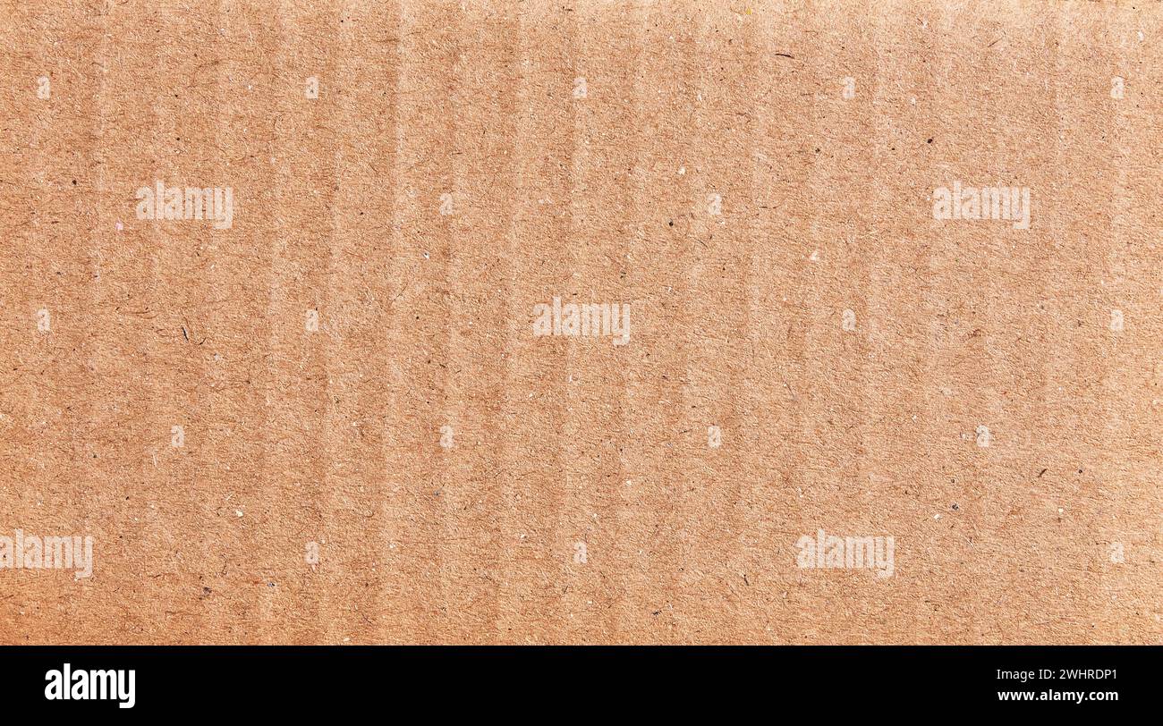 Brown cardboard carton material texture background Stock Photo - Alamy
