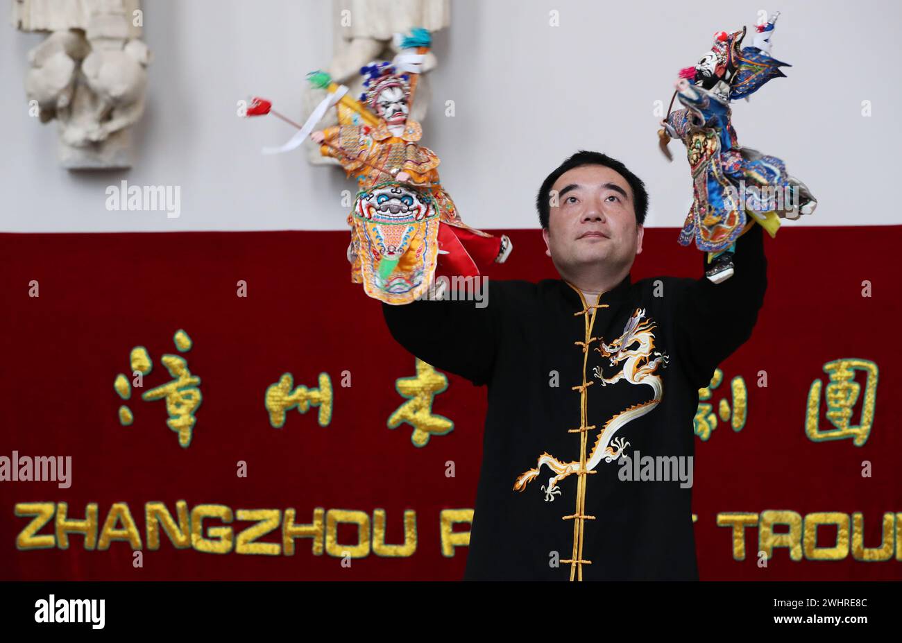 Paris, France. 10th Feb, 2024. An artist of Zhangzhou Puppet Troupe ...