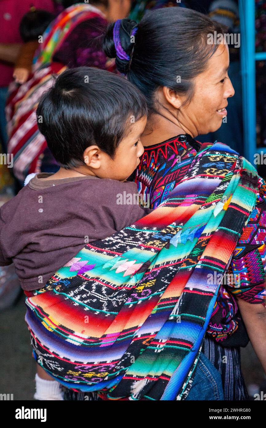 Chichicastenango, Guatemala. Quiche (Kiche, K'iche') Mother Carrying ...