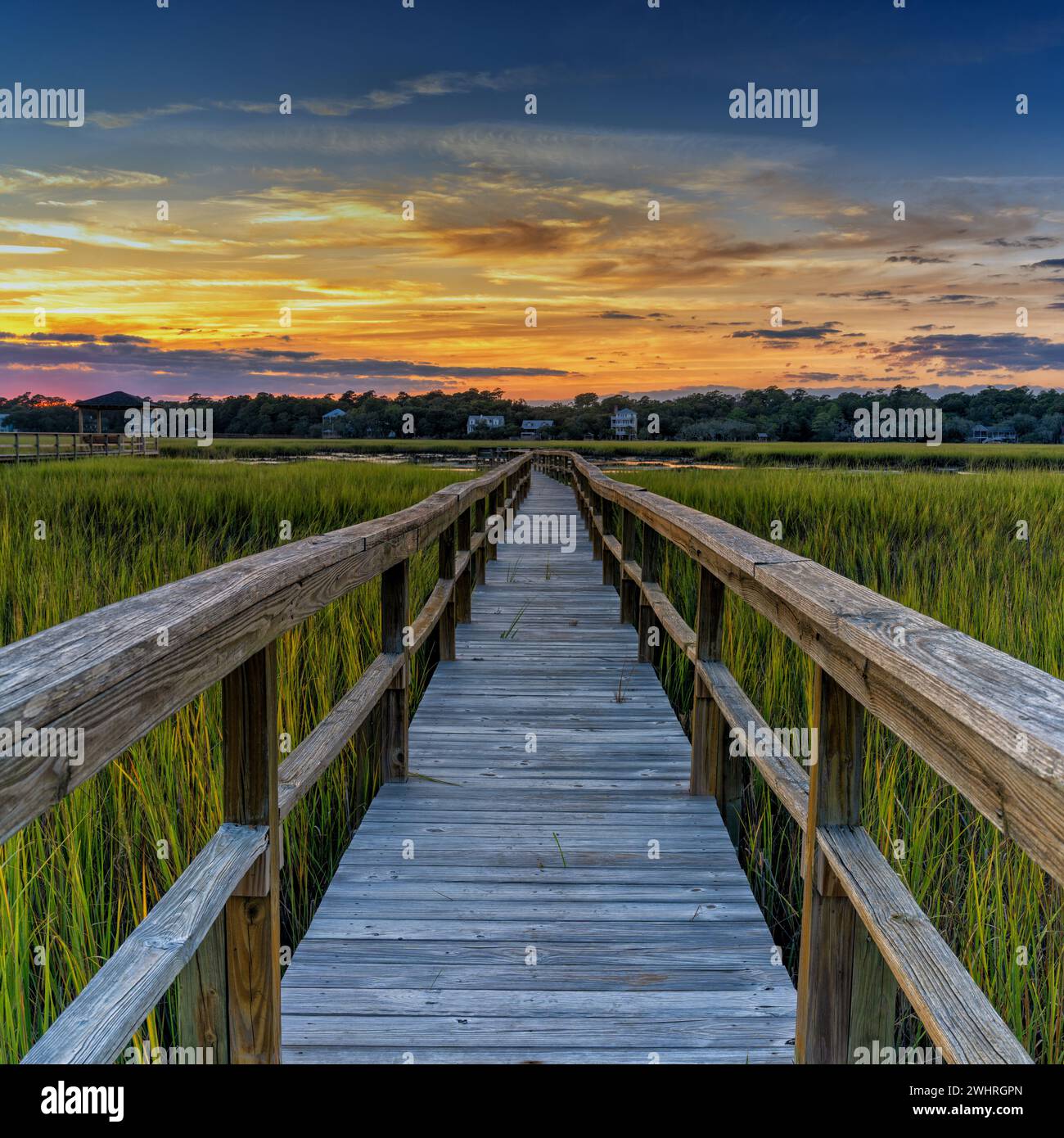 Long wooden dock on the inlet at Pawleys Island in South Carolina at ...