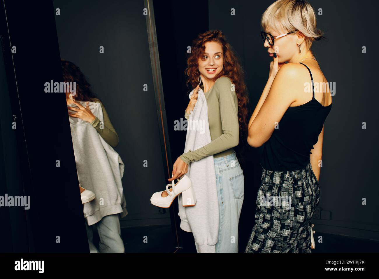 Helping customer young hi-res stock photography and images - Alamy